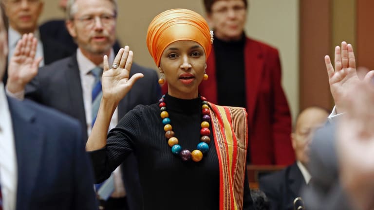 Photos of Ilhan Omar being sworn in to Congress prove just how ...