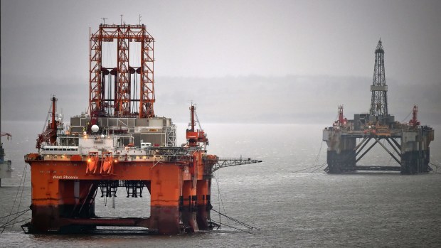 S&P downgrades Chevron, Exxon may be next