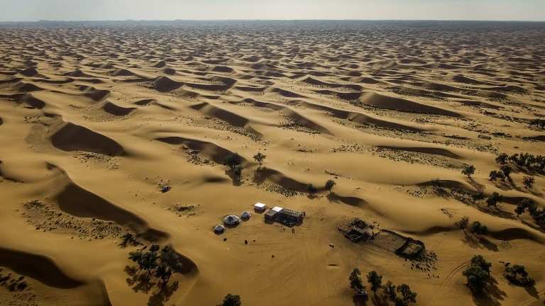 China's expanding deserts on a collision course with its cities
