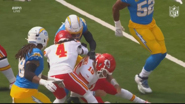 Patrick Mahomes collides with Chiefs teammate Rashee Rice.