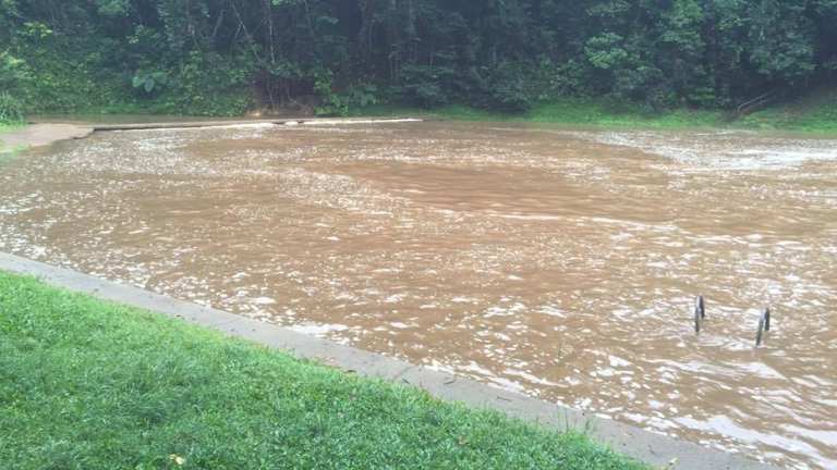 Far north Queensland on flood watch as heavy rain continues