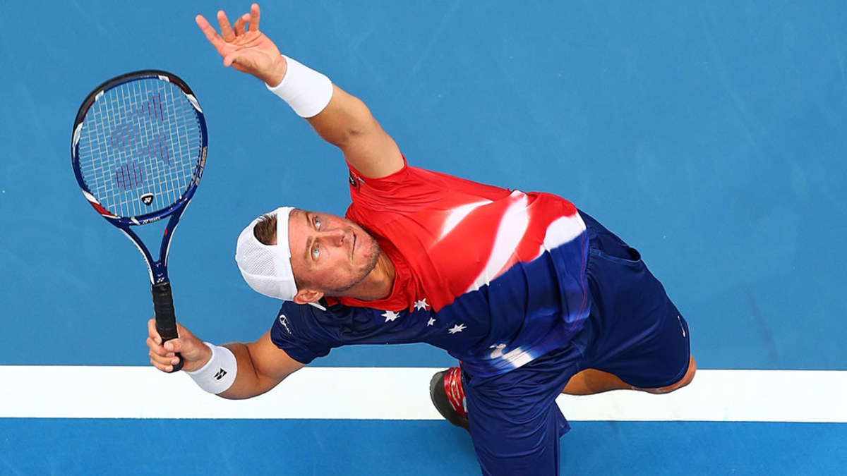 Hewitt goes down fighting in Perth