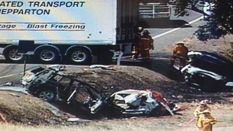 One dead after three cars, truck crash in Shepparton