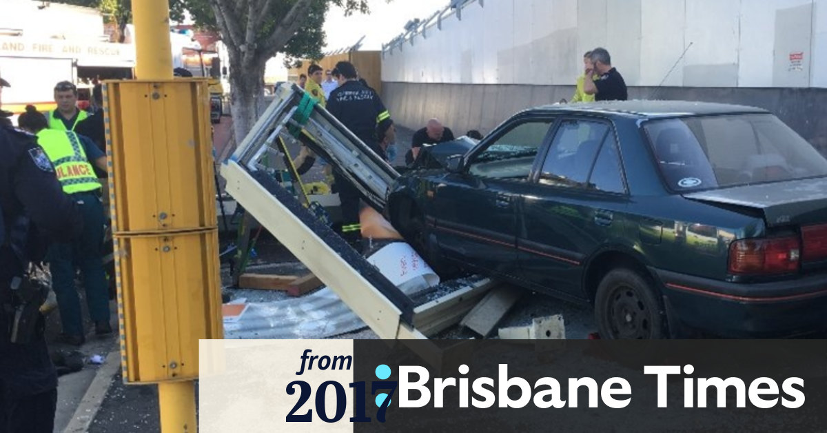 Car crashes into Brisbane bus stop: delays, three injured