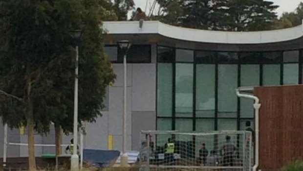 Burmese refugee refuses to climb down from Broadmeadows detention ...