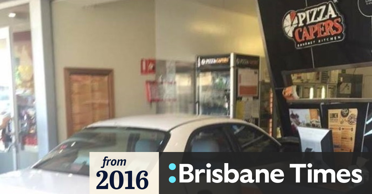 Car crashes through shop window in Brisbane's north