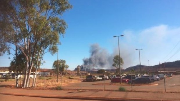 Newman mine site fire: BHP employee treated for smoke inhalation