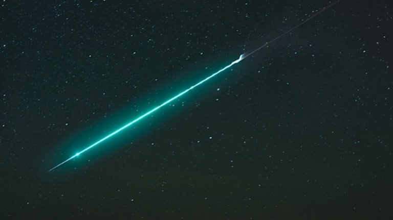 Meteor shines bright green in spectacular chance photo