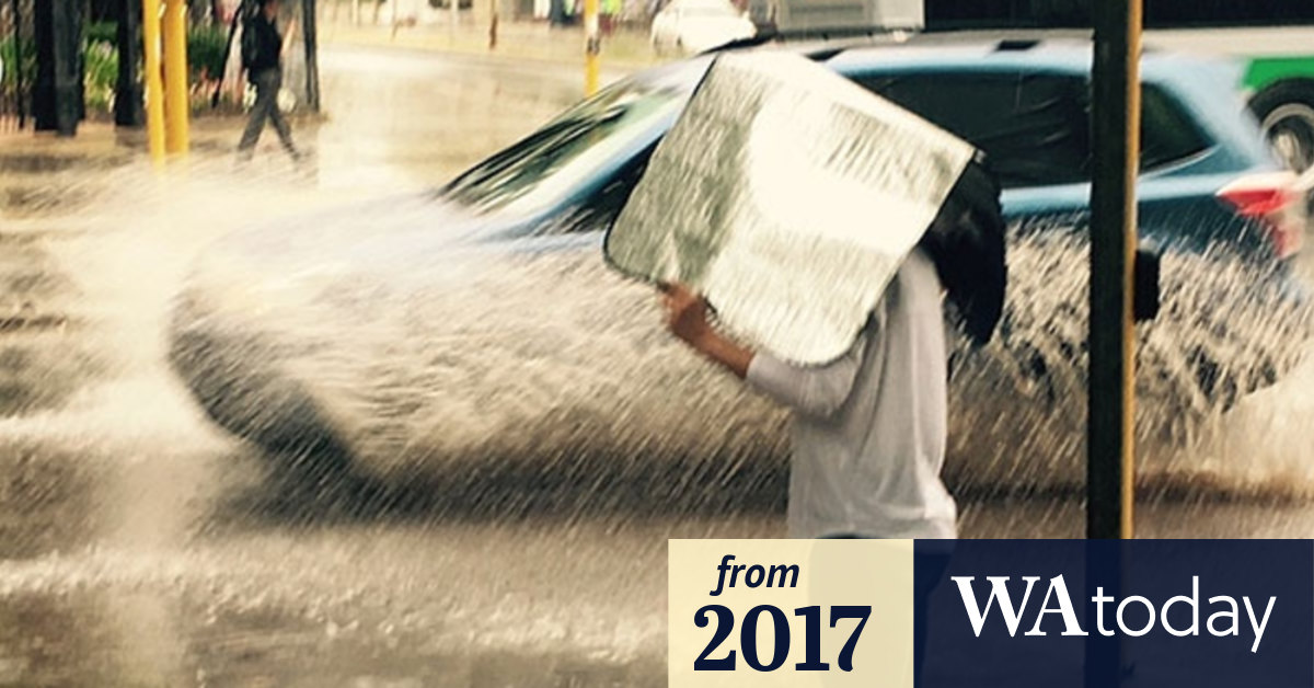 Summer on hold: 'Winter' storm to batter Perth with heavy rain