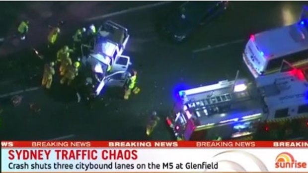 Sydney traffic: Hume Motorway crash at Glenfield causes peak-hour delays
