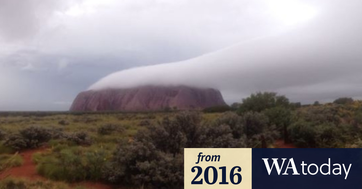 Stunning photo captures fog rising off Uluru