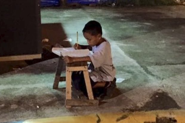 Homeless Filipino boy overwhelmed by support after being photographed ...