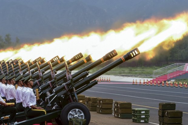 China stages live fire military drills