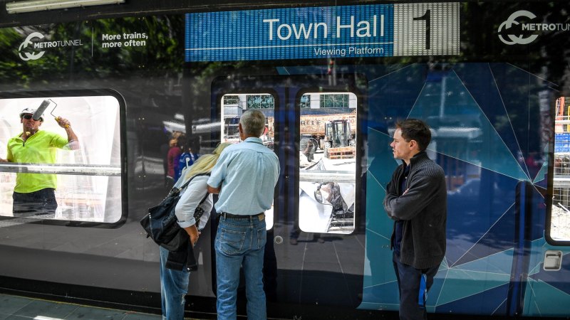 Train now standing at Town Hall station gives passersby a building sight