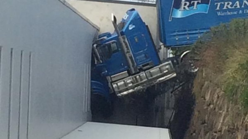 Truck crashes through building wall at Brisbane industrial park