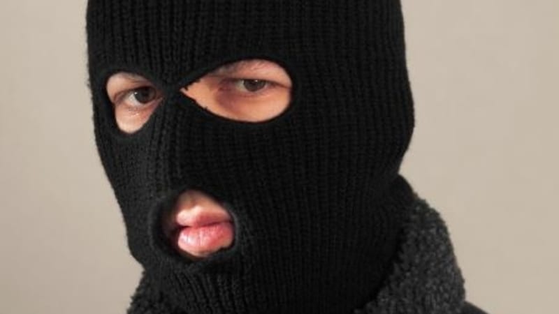 Teenager threatened by several men in balaclavas during robbery