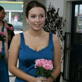 She's spent $22,000 on getting married. She's not the bride