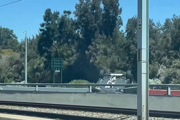 Kwinana Freeway closure: Two people arrested after crashing stolen car