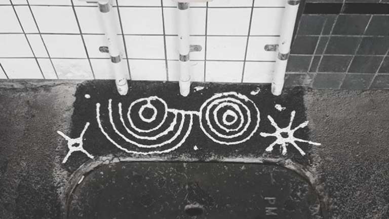 The story behind the cryptic drawings appearing on Melbourne footpaths