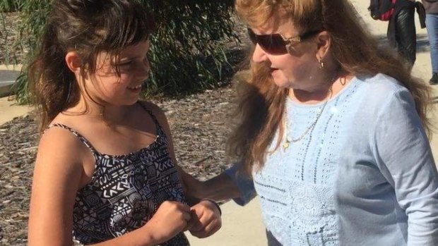 WA woman thanks young girls who 'saved her life' after dog attack