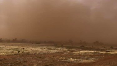 Dust storm rolls through Melbourne, as snow falls at Mount Baw Baw