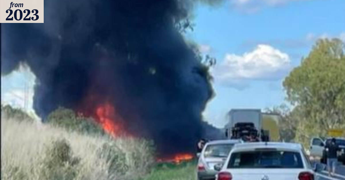 Truck carrying army tank in fiery seven-vehicle crash on highway