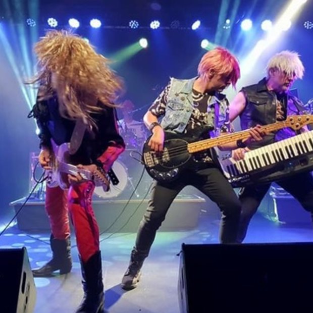 The middle-aged career bigwigs making rock music