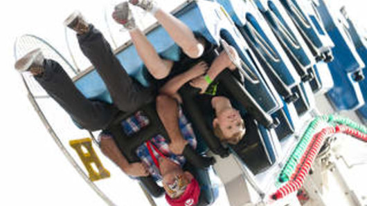 Woman fighting for life after being flung from carnival ride in Cairns