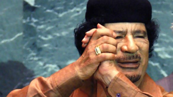 Libyan leader Gaddafi defends Taliban