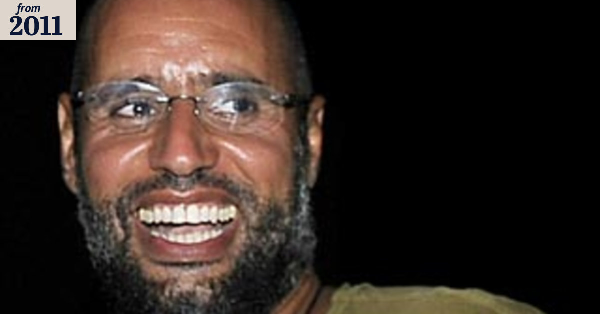 Gaddafi security chief flees, rebels keep negotiating