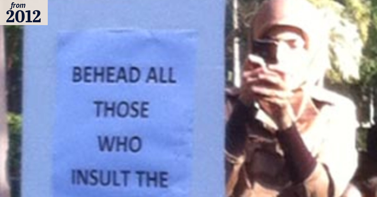 'Behead' sign child deemed safe as mother talks to police