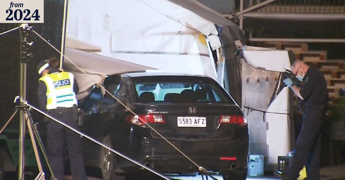Man pinned between car and trailer in alleged hit-run